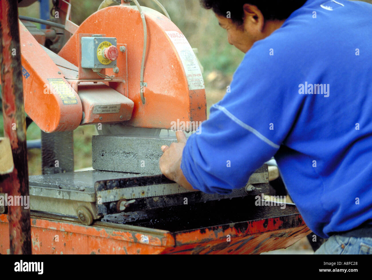 cutting concrete blocks on construction site Stock Photo - Alamy