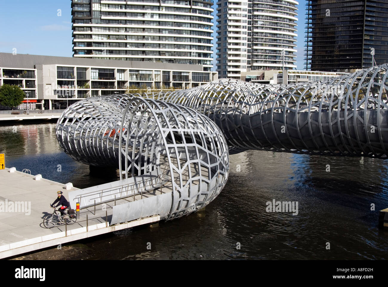 View of spectacular new steel Webb Bridge over Yarra River in Docklands ...