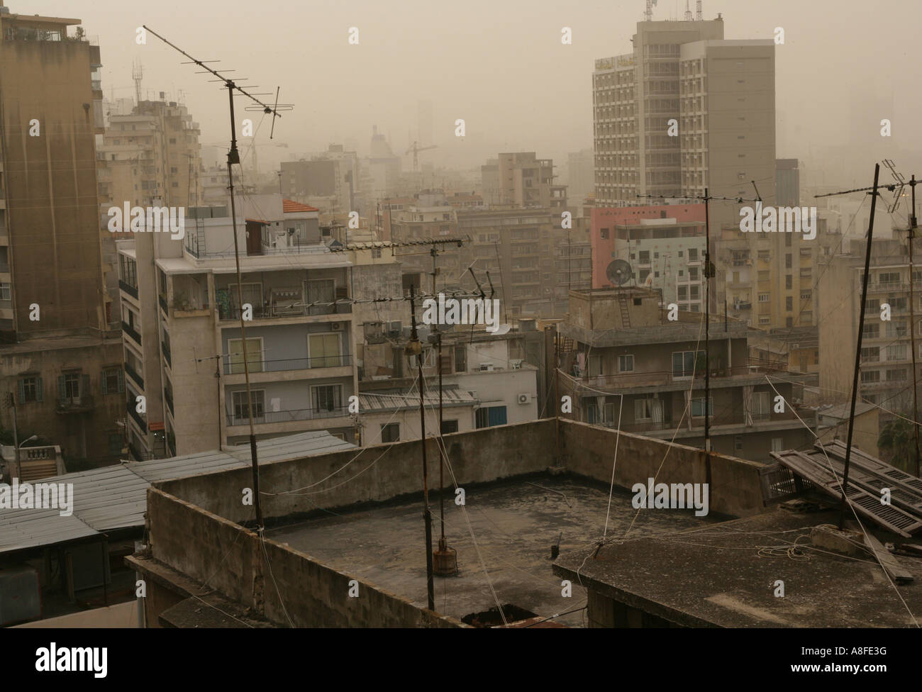 Hazy rooftop city skyline during khamsin storm, Beirut, Lebanon, Middle ...