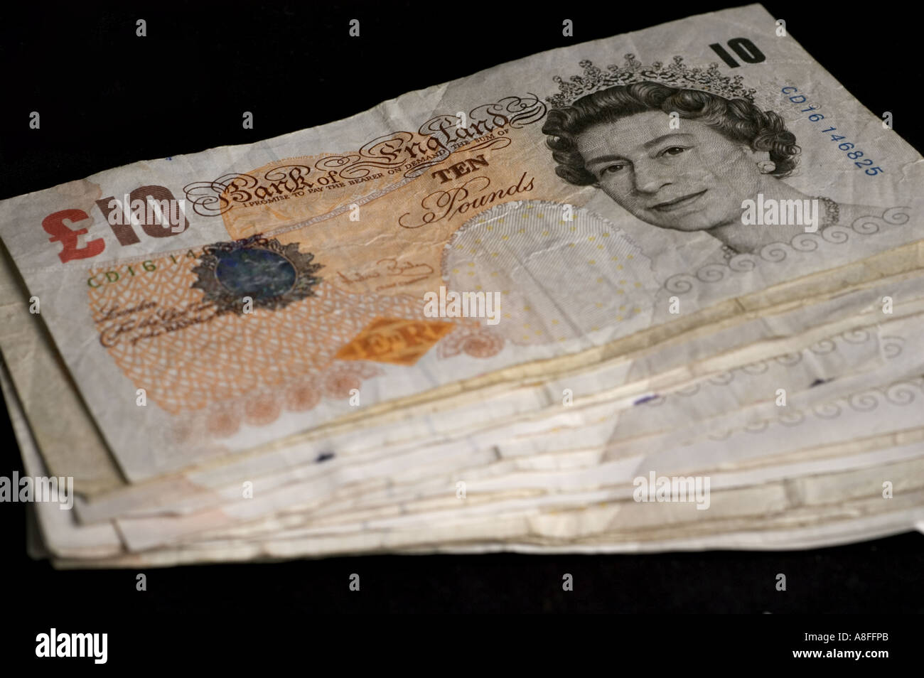 10 pound notes pile hi-res stock photography and images - Alamy