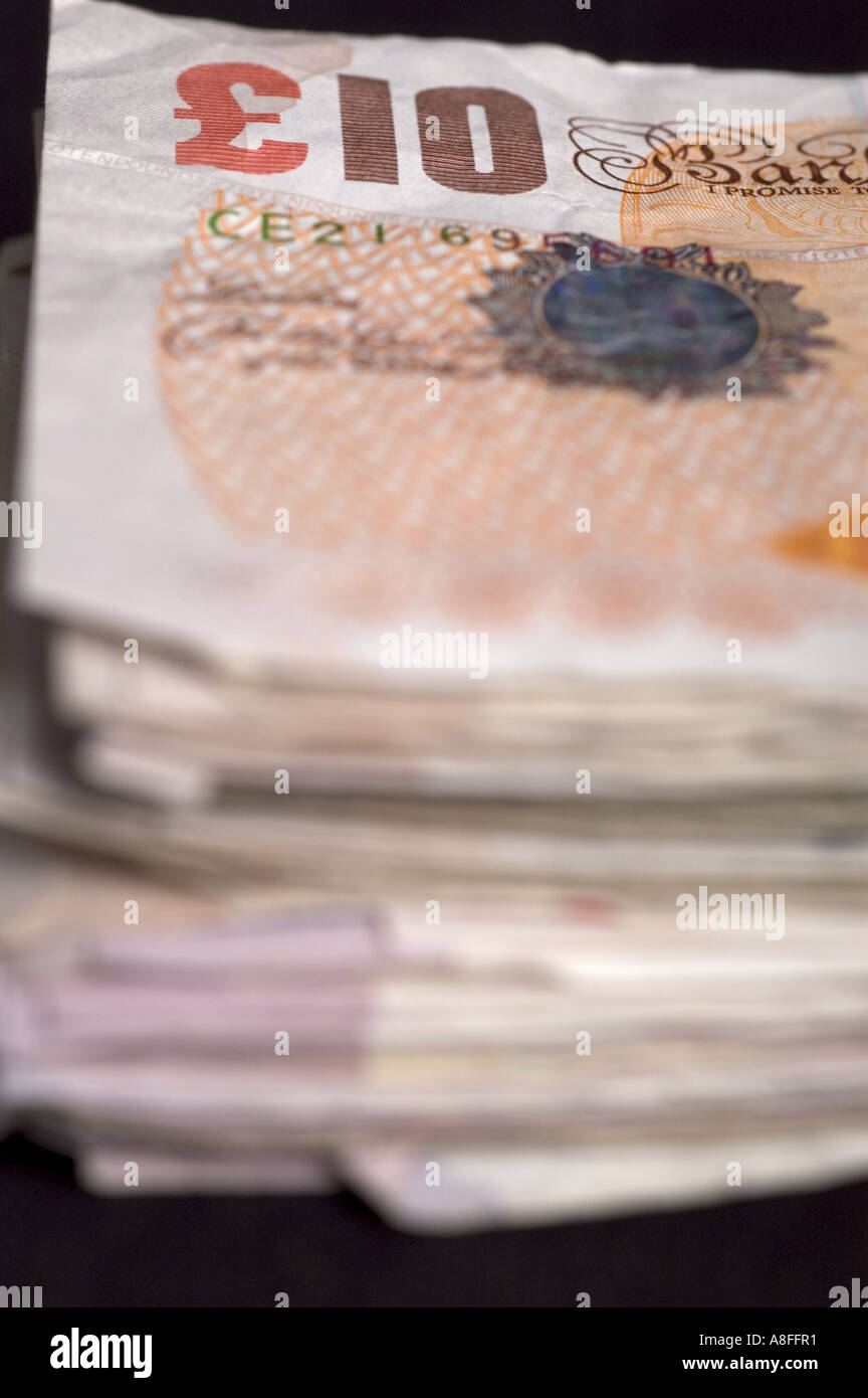 10 pound notes pile hi-res stock photography and images - Alamy
