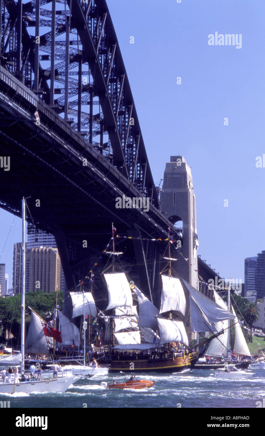 Tall ships pass under the Sydney Harbour Bridge during the Australia ...