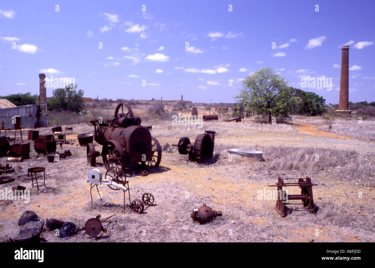 Rusted gold mining relics litter the outback landscape of Ravenswood of ...