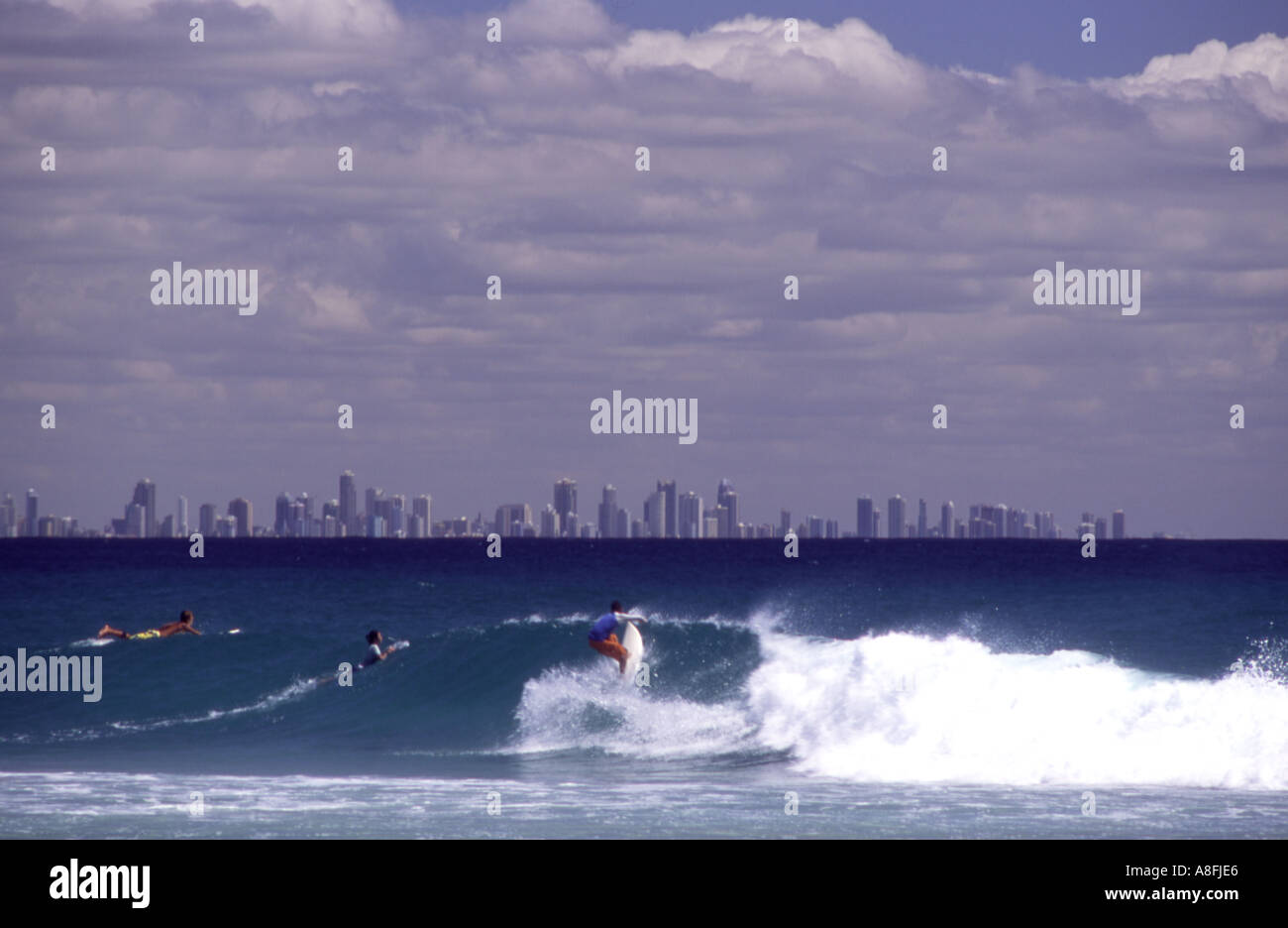 Surfers riding the waves at Coolangatta Gold Coast Queensland Australia ...