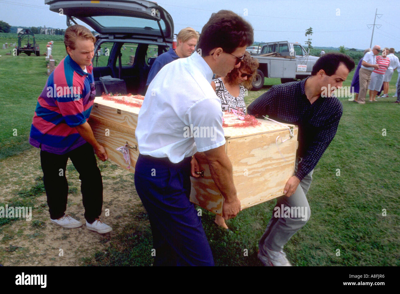 Men carrying casket hi-res stock photography and images - Alamy