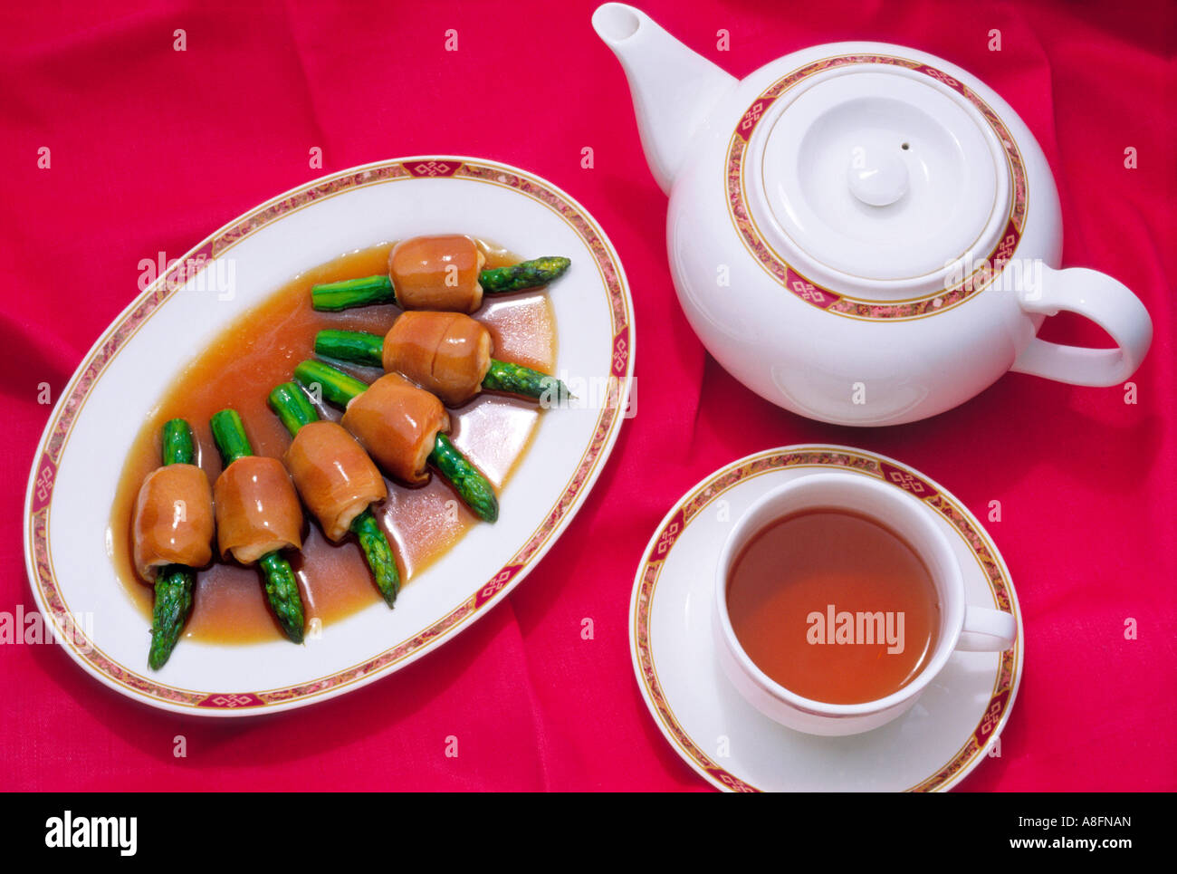 Abalone roll with asparagus and shrimp paste Stock Photo - Alamy