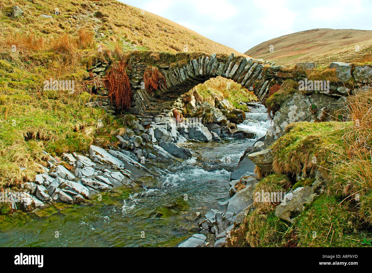 Ancient packhorse bridge in the Howgill Fells, Cumbria, England, UK ...