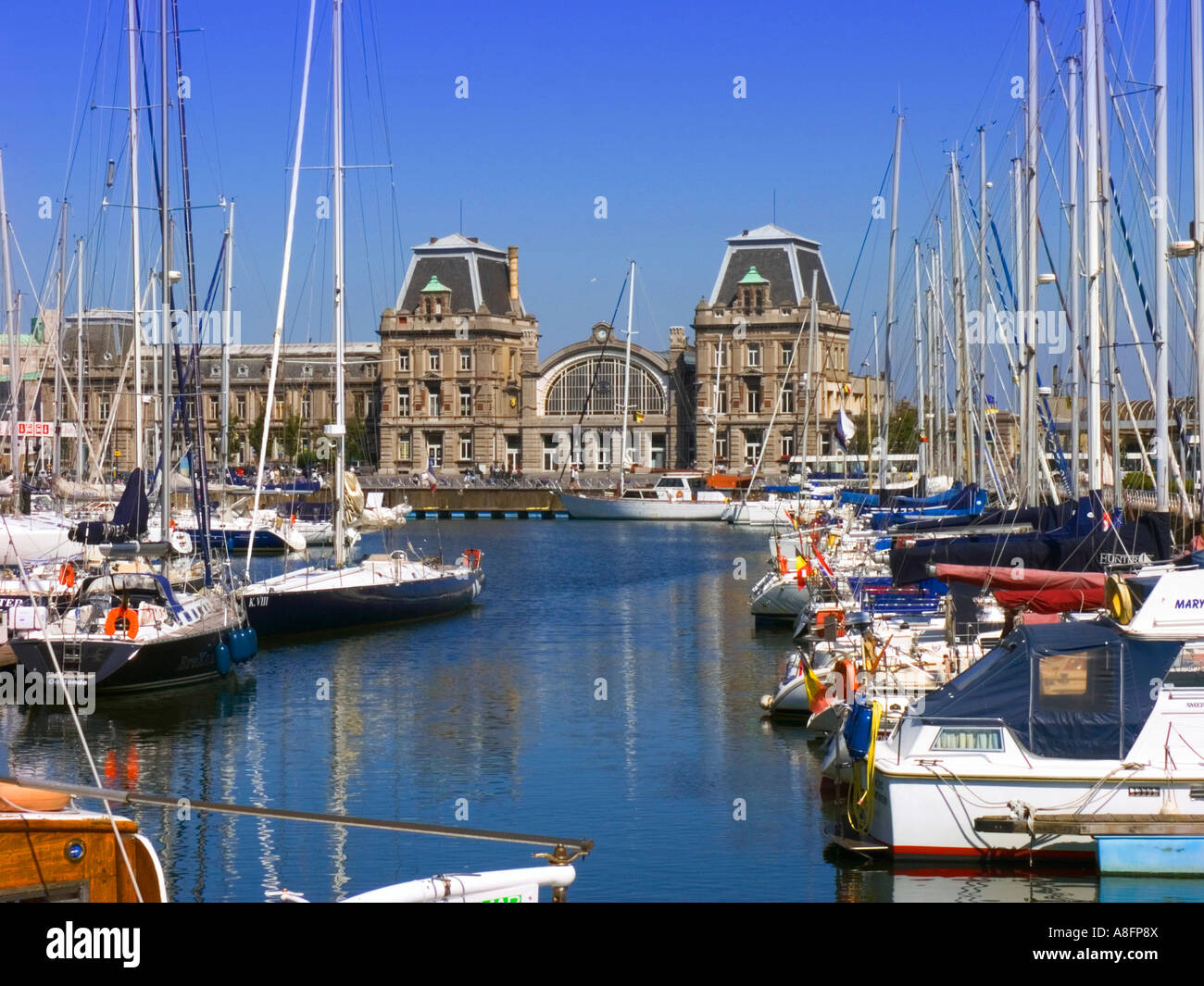 Belgium Ostend Oostende Ostend train station along canal and yacht ...