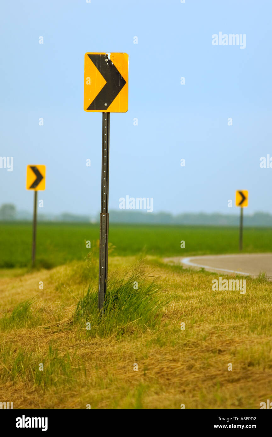 Curve signs along highway Stock Photo - Alamy