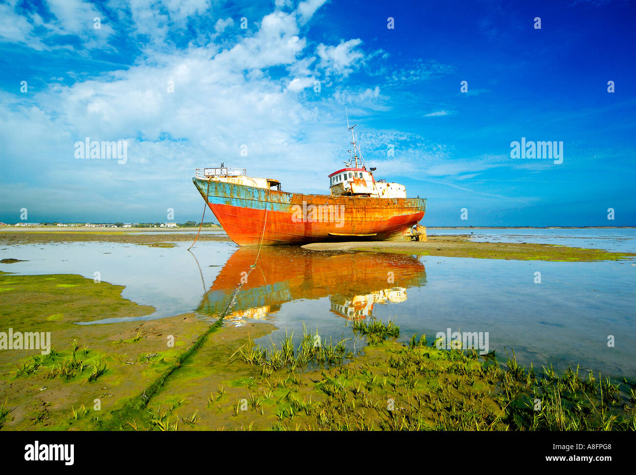 Rusting boat near Roa Island, Barrow in Furness, Cumbria, England, UK ...