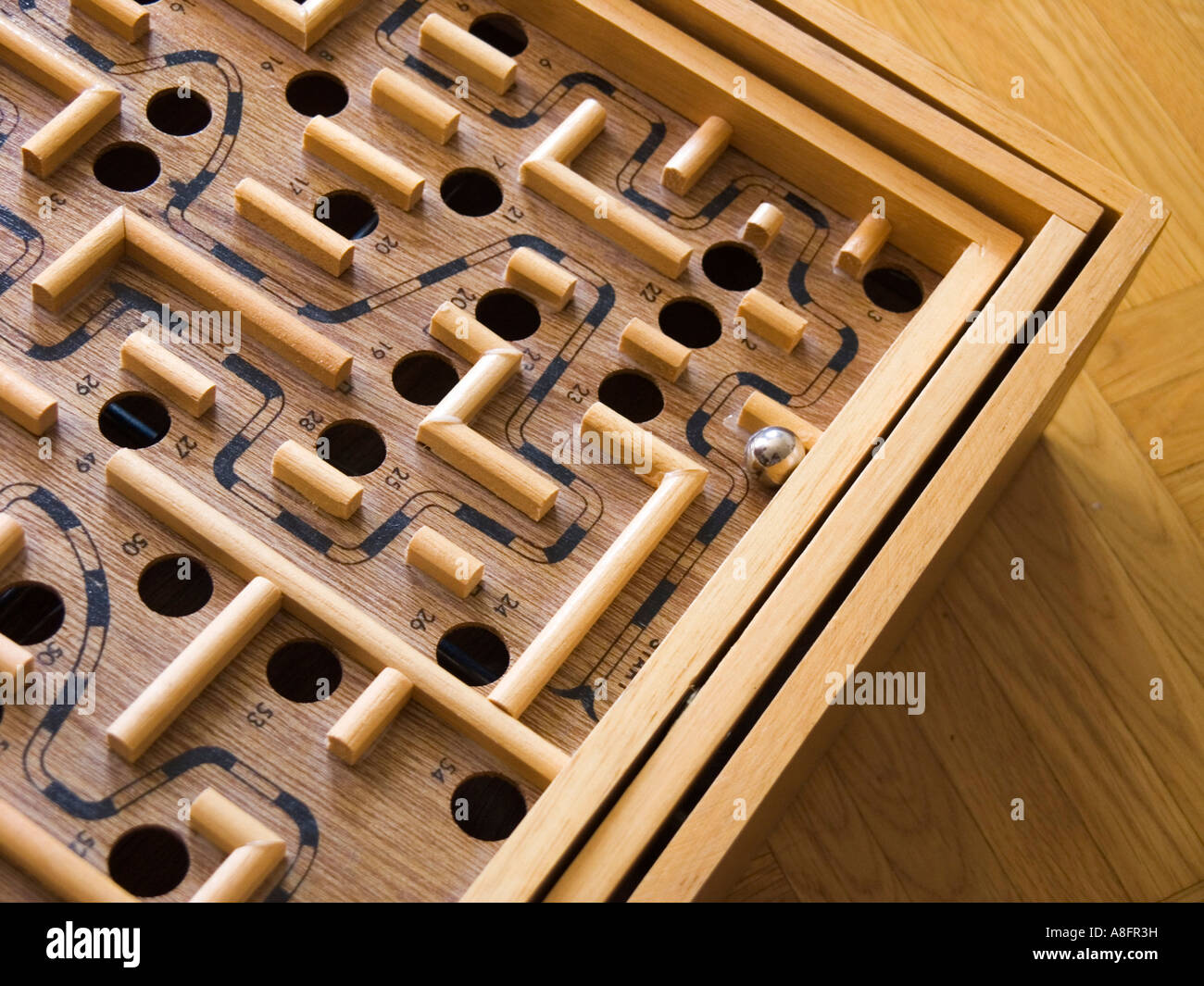 Boy play Labyrinth Stock Photo - Alamy