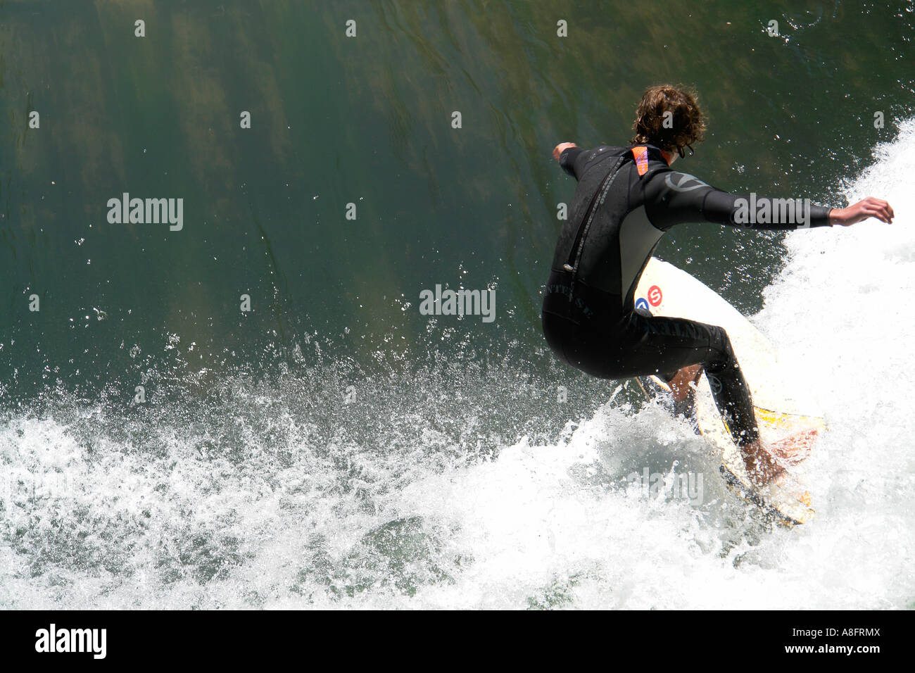 Board surfing on river Isar Munich Bayern Germany Stock Photo - Alamy