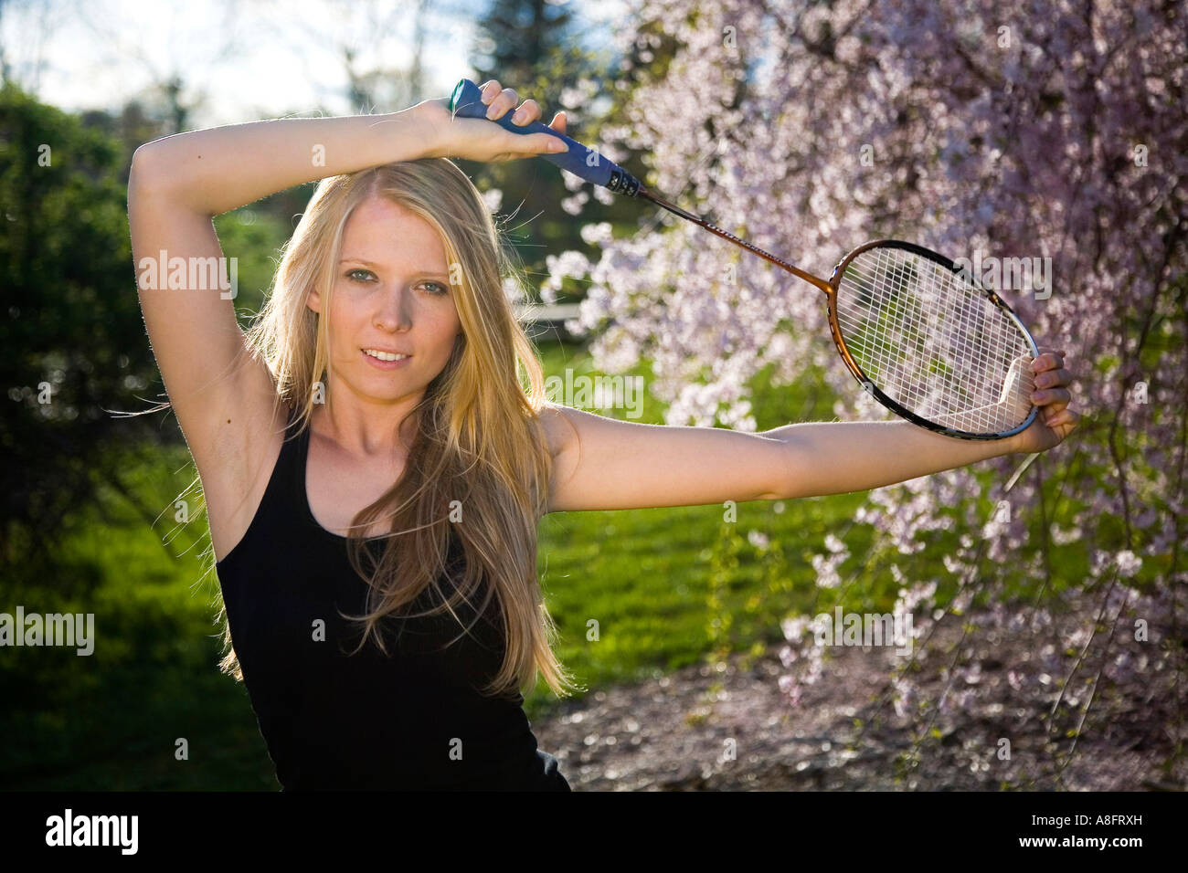 Beautiful Girl Playing Badminton Stock Photo - Alamy