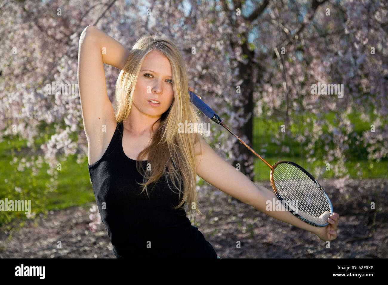 Beautiful Girl Playing Badminton Stock Photo - Alamy