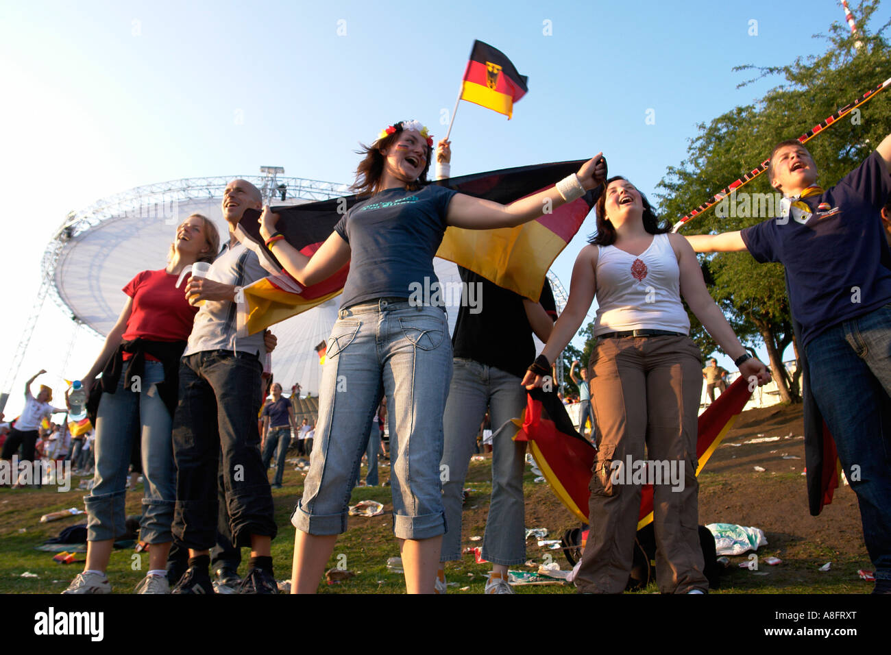 German Football fans waving flag to support their team after winning WM ...