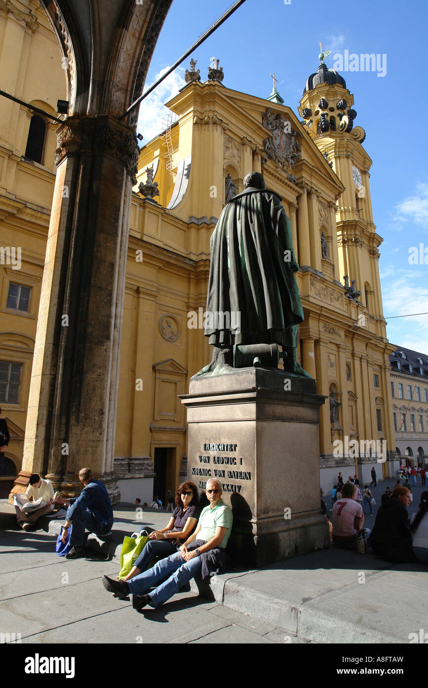 Tourists sit at Feldherrenhalle Odeonsplatz Munich Bavaria Germany ...