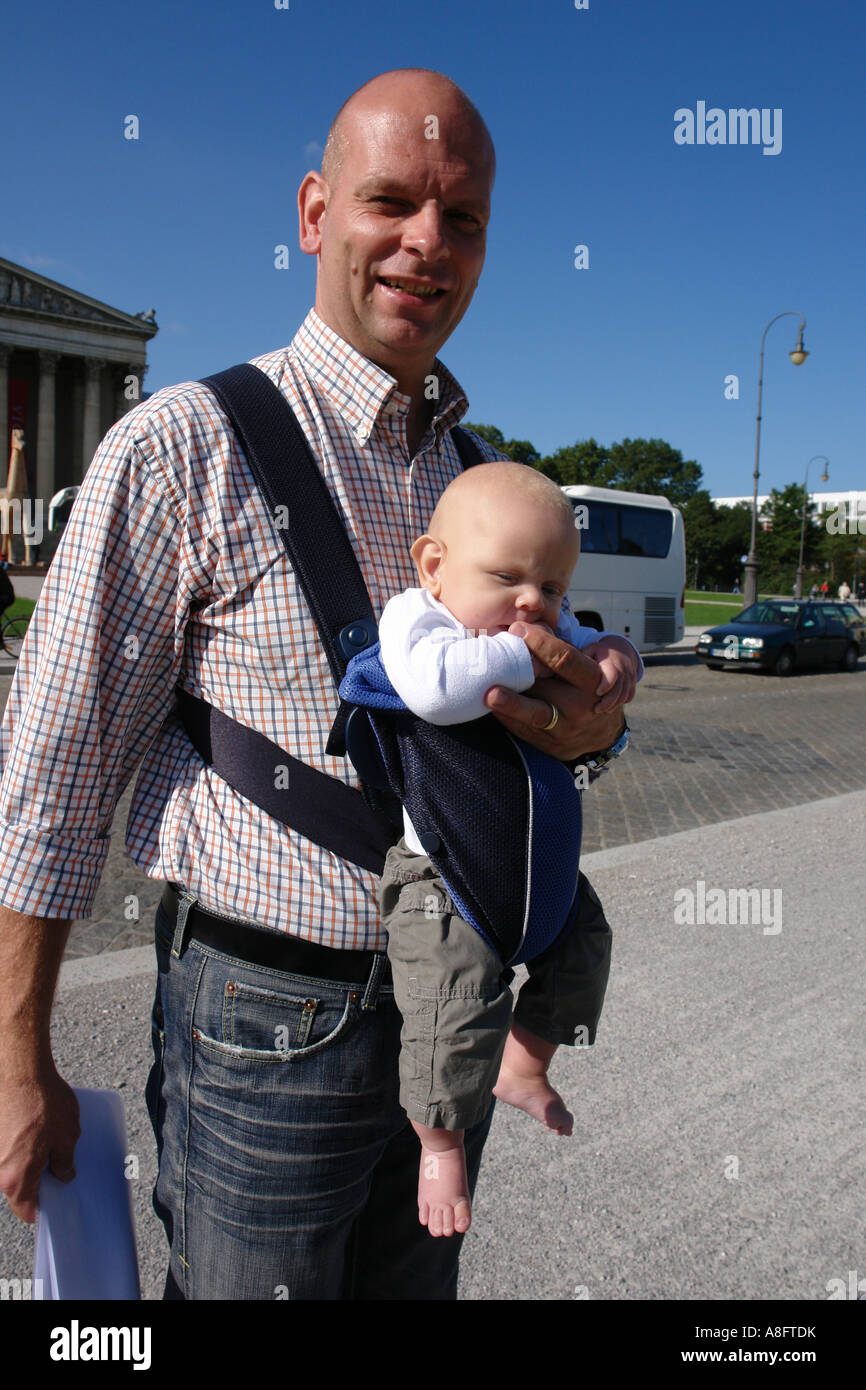 Man with baby Stock Photo - Alamy