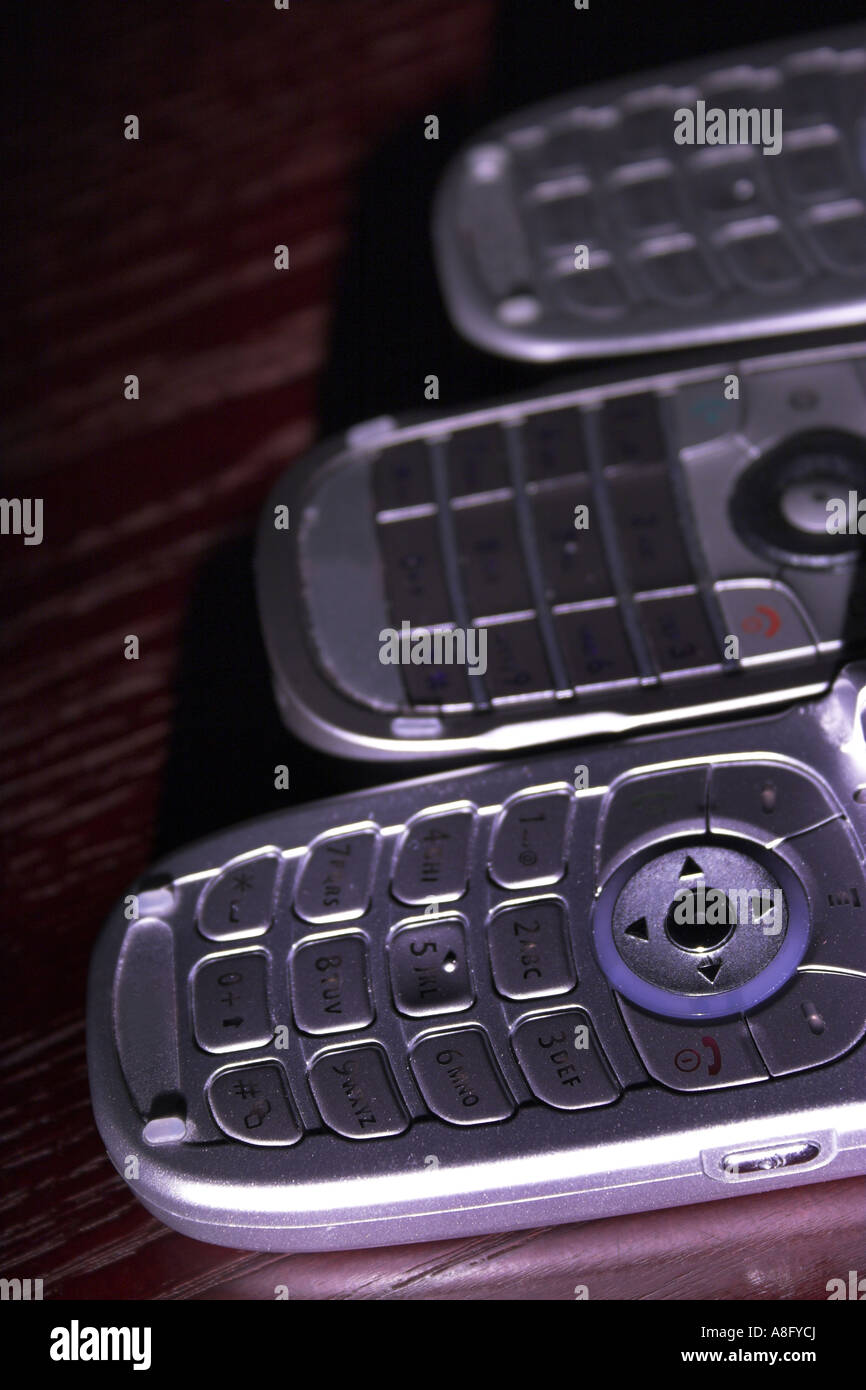 Three mobile phone handsets Stock Photo - Alamy