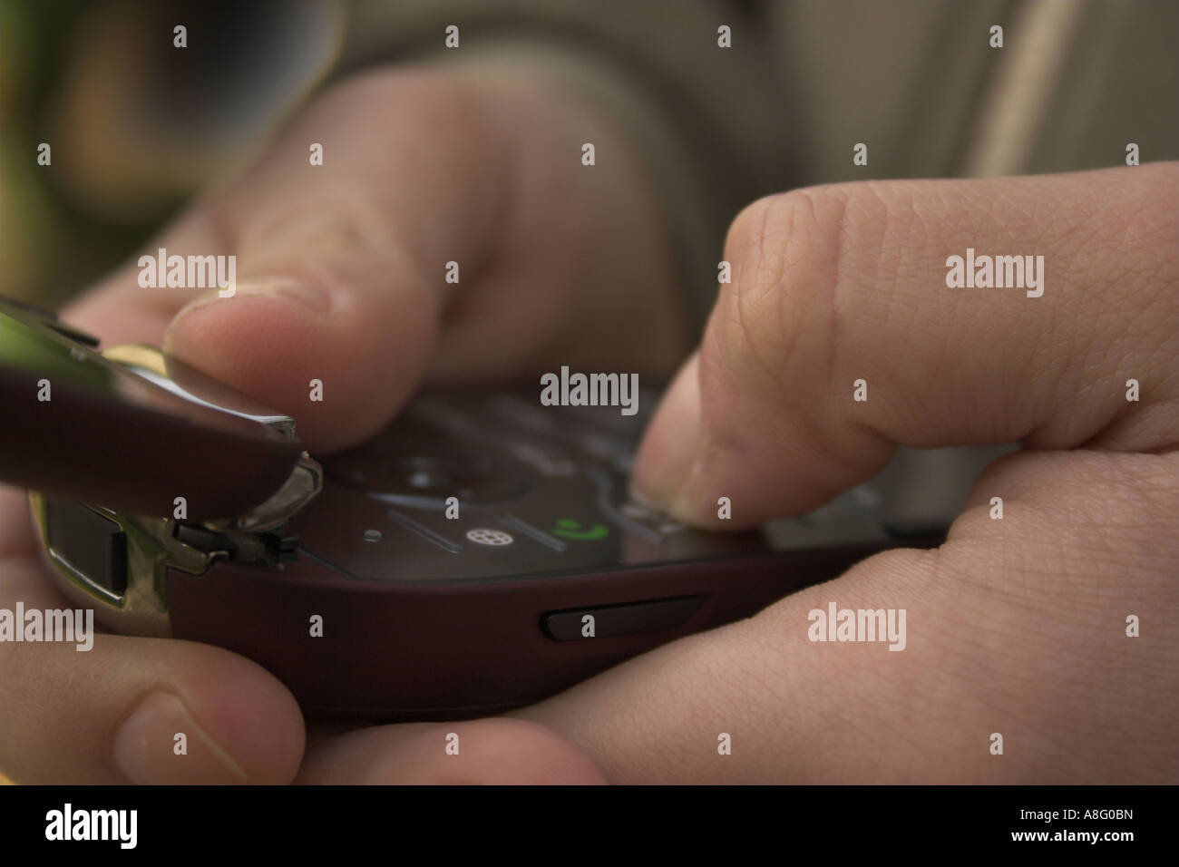 Texting on a mobile phone Stock Photo - Alamy