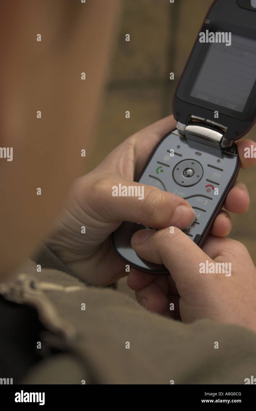 Texting on a mobile phone Stock Photo - Alamy