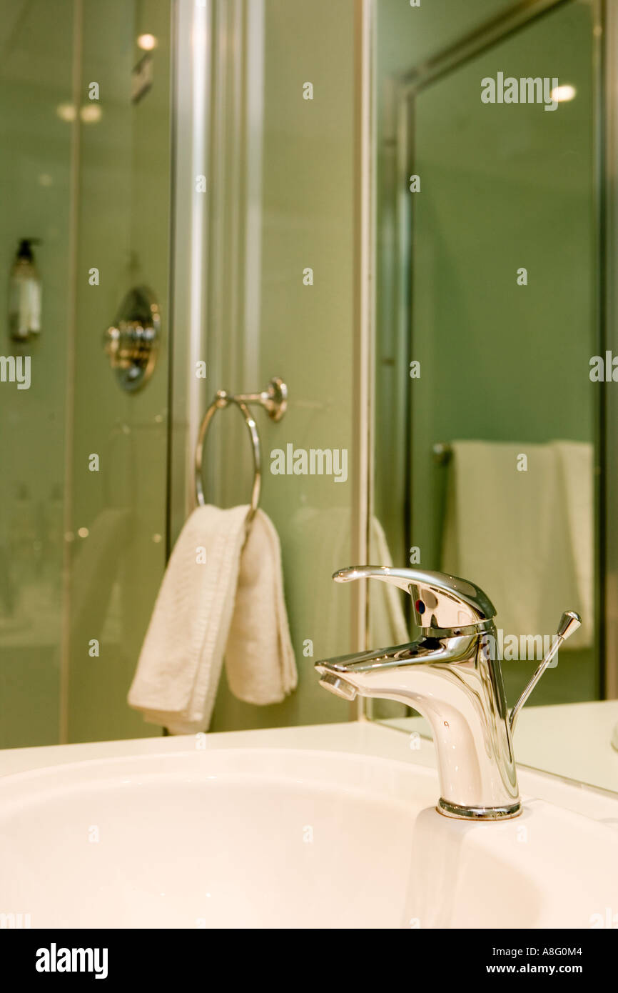 Bathroom sink and shower Stock Photo - Alamy