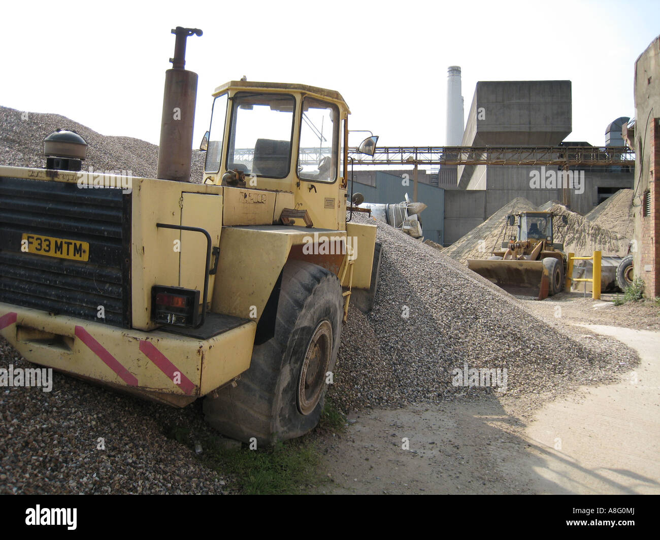 JCB in gravel workyard london england Stock Photo - Alamy