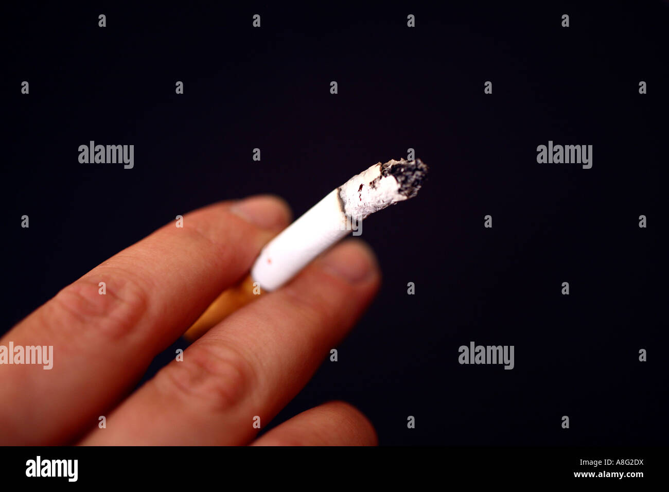 Lit cigarette hi-res stock photography and images - Alamy