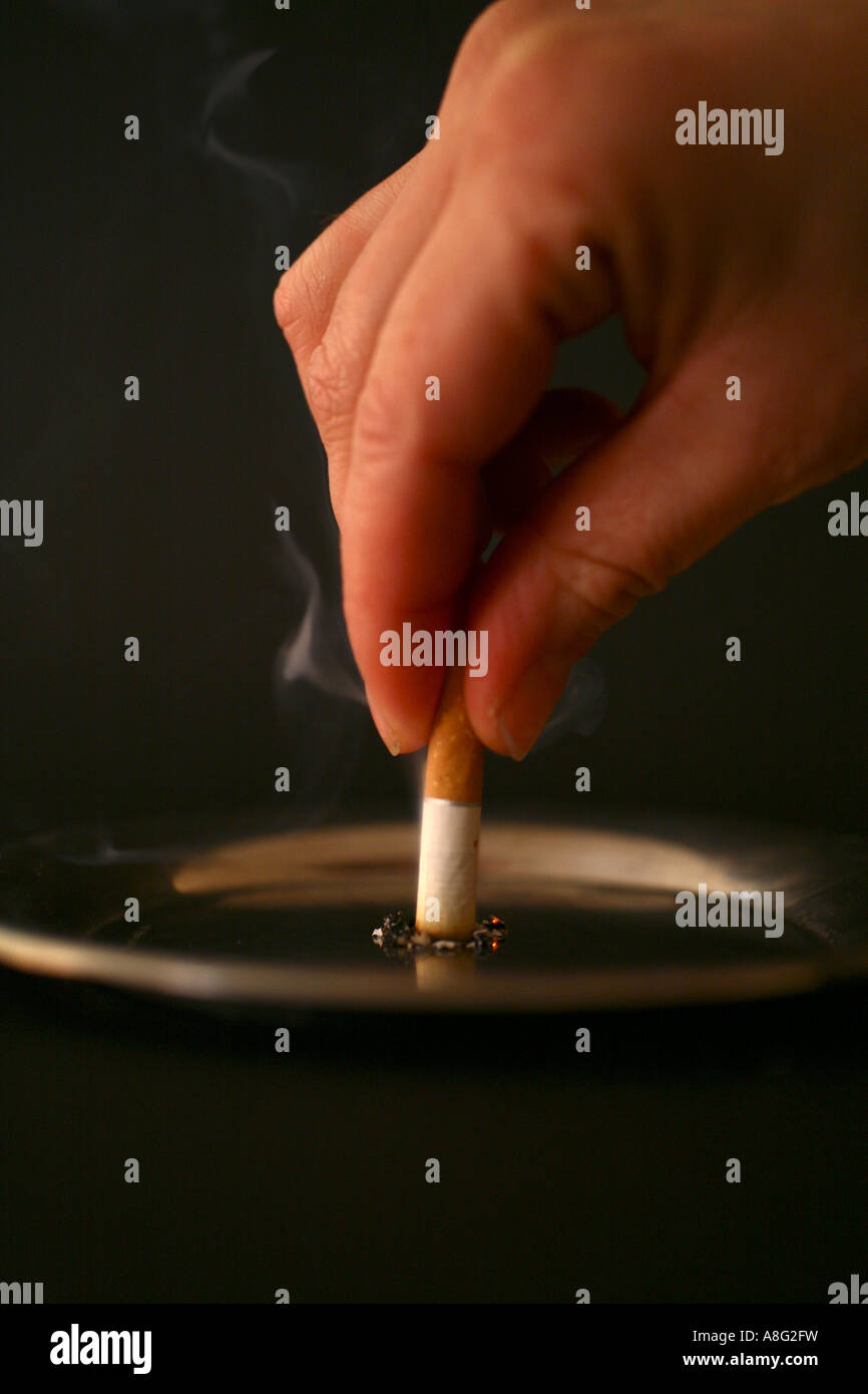 Stubbing Out Cigarette High Resolution Stock Photography and Images - Alamy