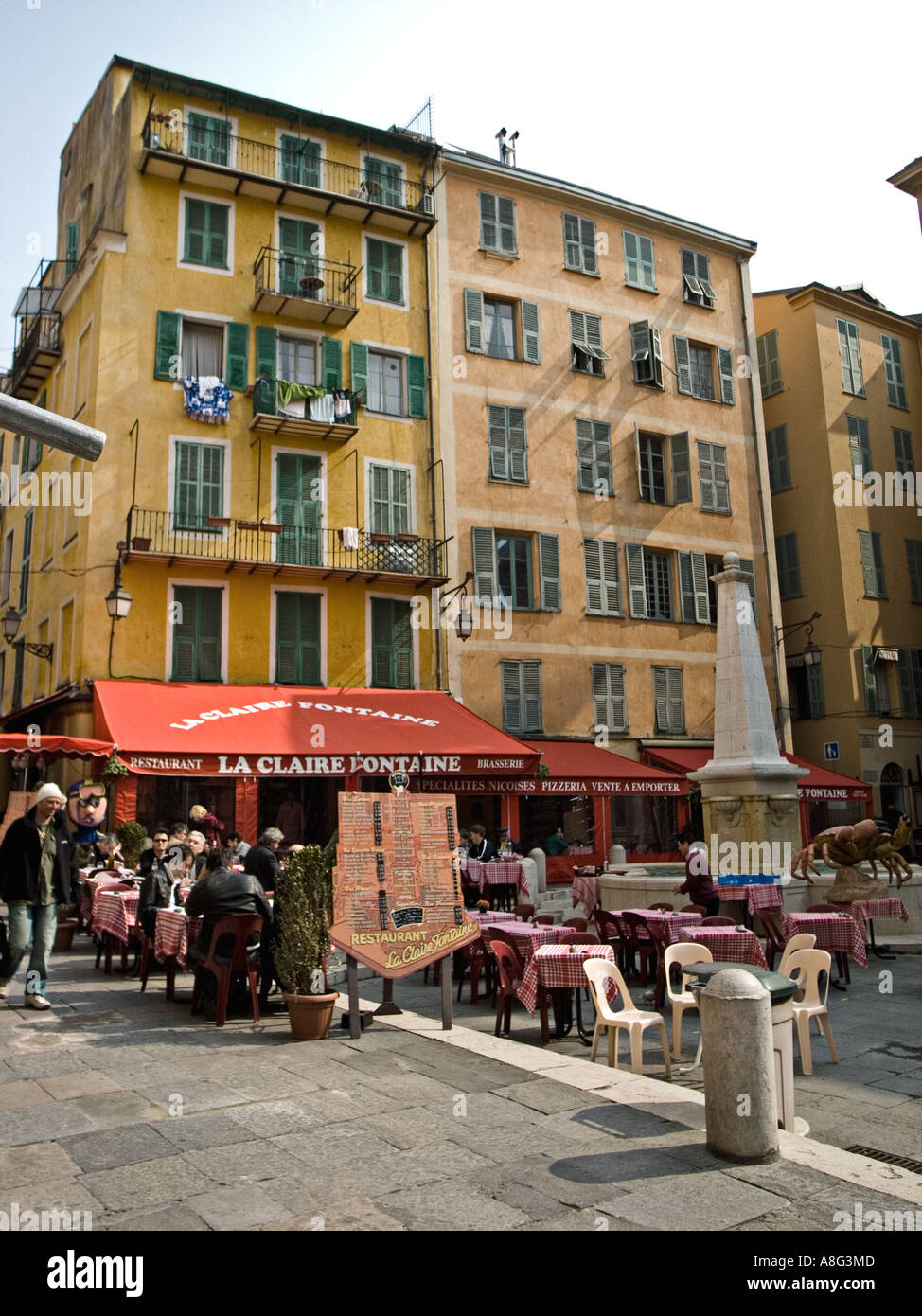 Nice Cote dAzur France - Cafes in front of typical Provencal buildings ...