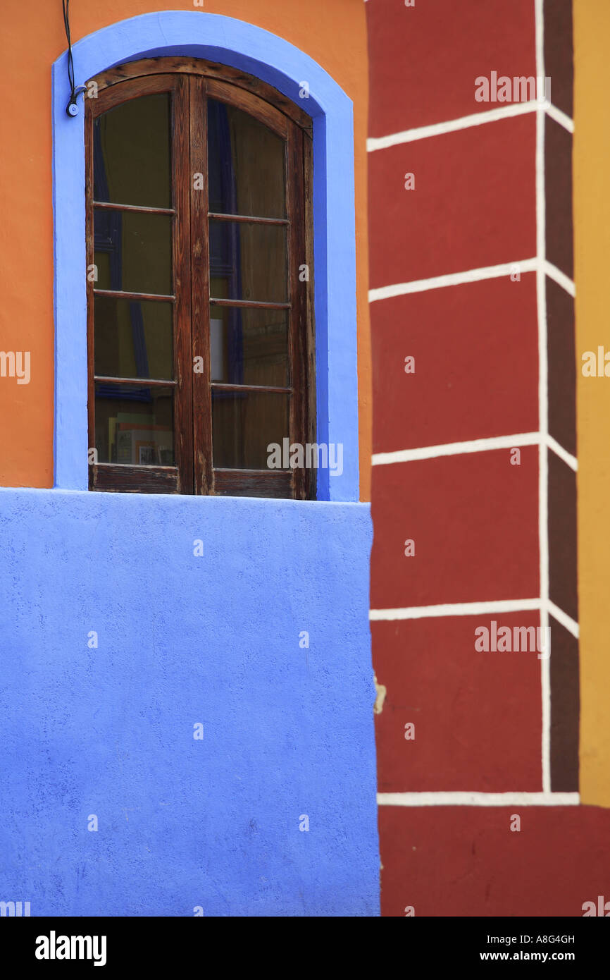 Gaily painted street corner & window in Guia de Isora Tenerife Stock ...