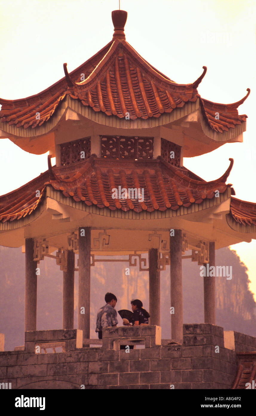 couple in a temple, Yangshuo, China Stock Photo - Alamy