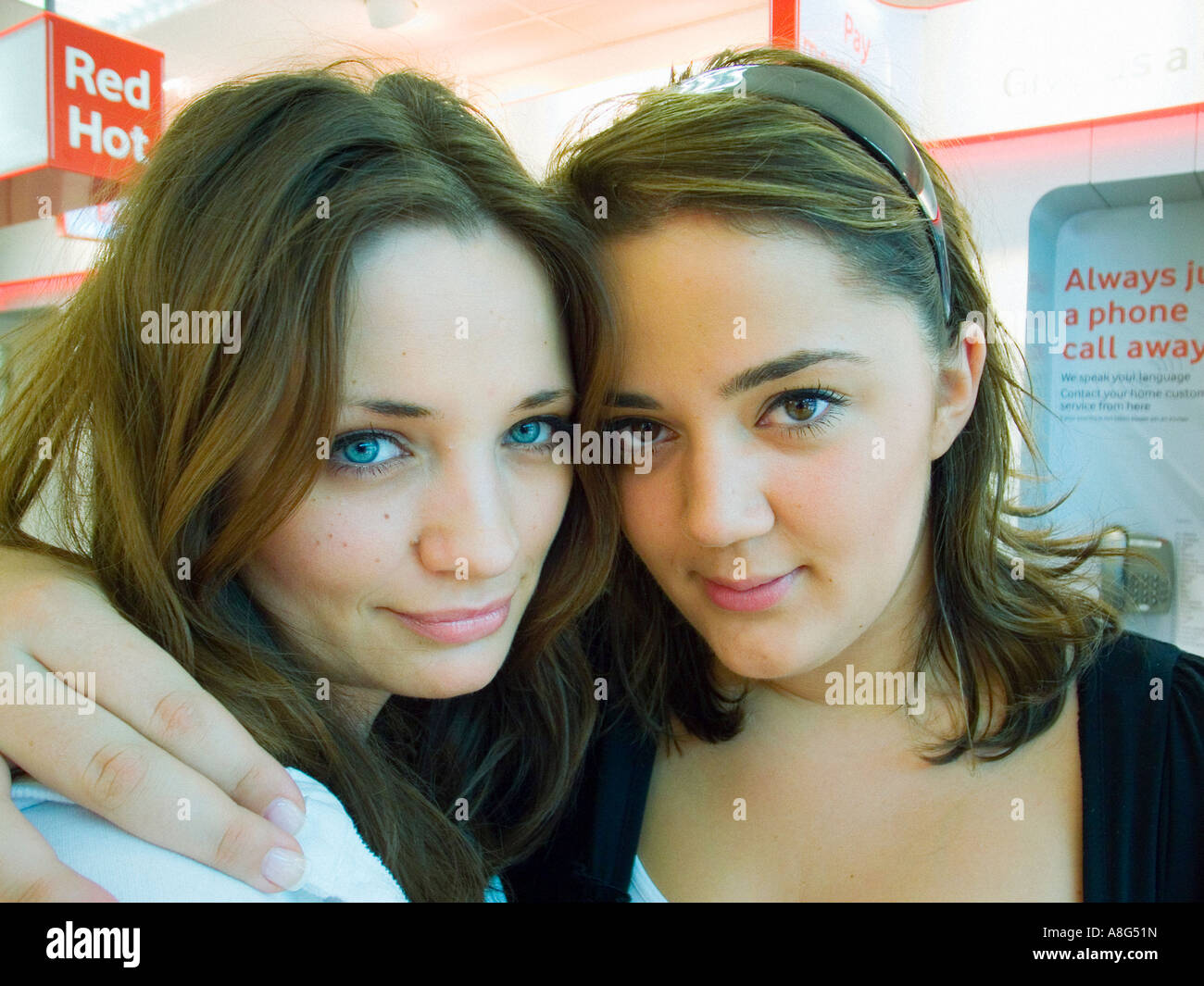 two friends cuddling each other Stock Photo - Alamy