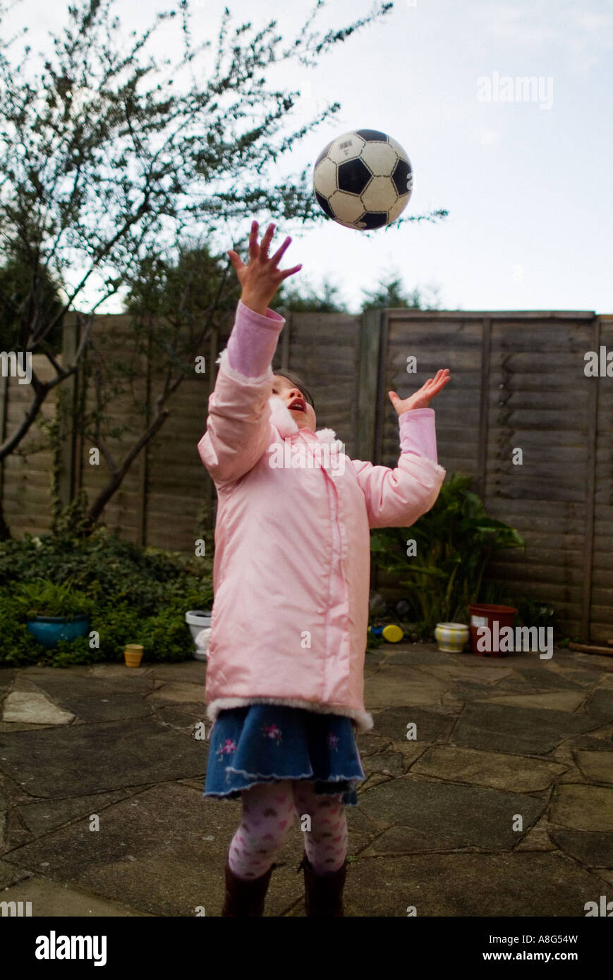 child playing with a ball Stock Photo - Alamy