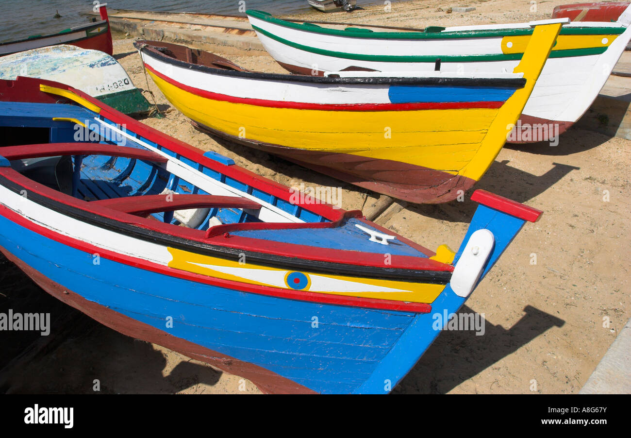 Fishing boats painted in vivid traditional colours in the Portuguese ...