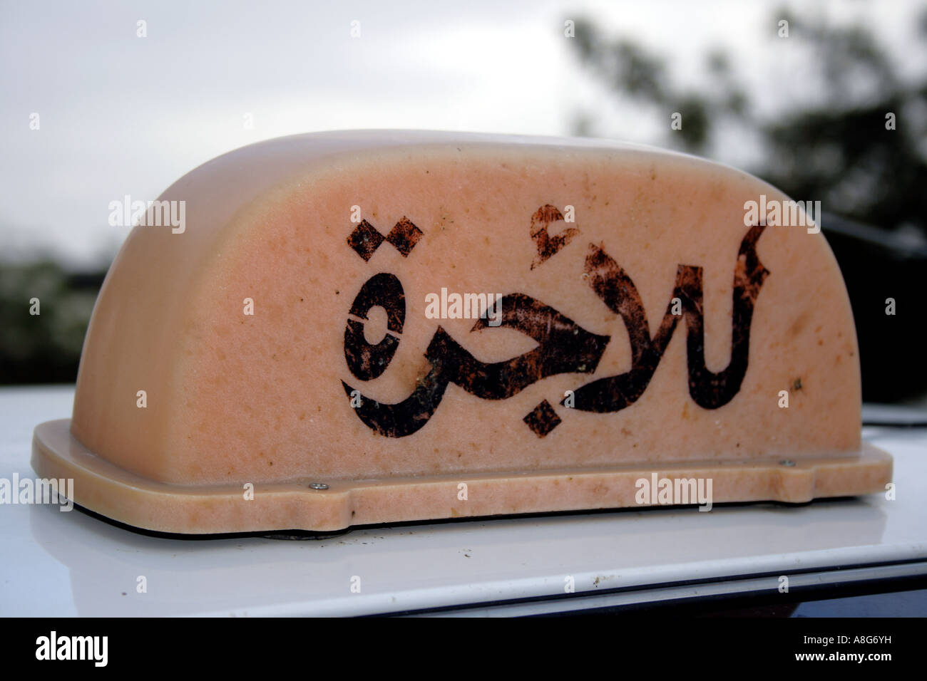 Arab Taxi sign on top of car at Dubai, United Arab Emirates. Photo by ...