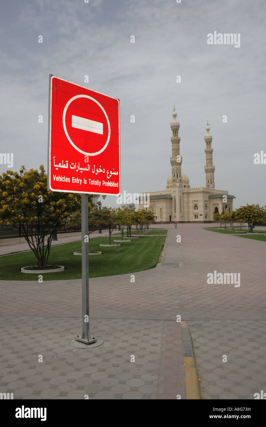 one way sign at the entrance of the mosque in the city of Sharjah, next ...