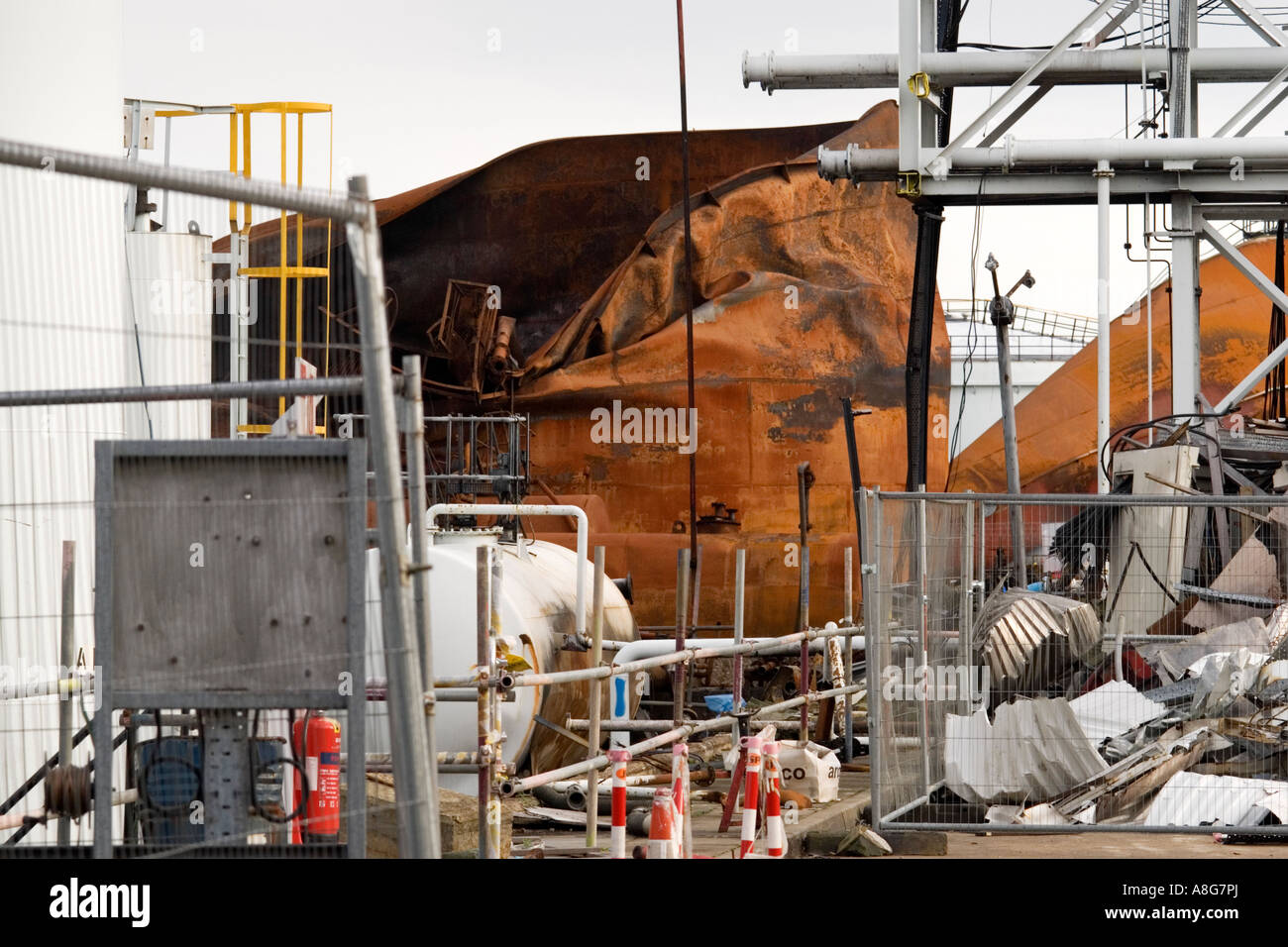 Damaged oil tanks and debris, Buncefield depot, Hemel Hempstead ...