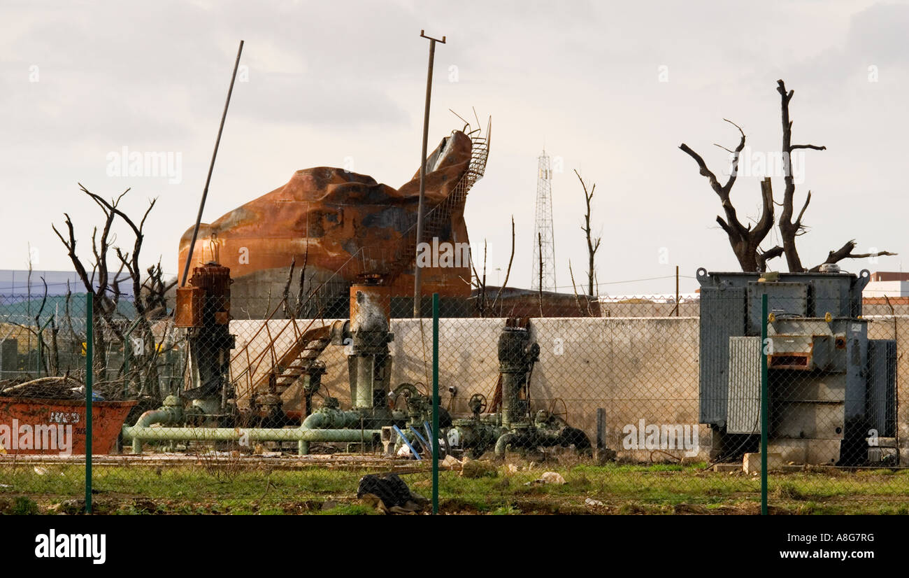 Damaged oil tanks and blasted trees, Buncefield depot, Hemel Hempstead ...
