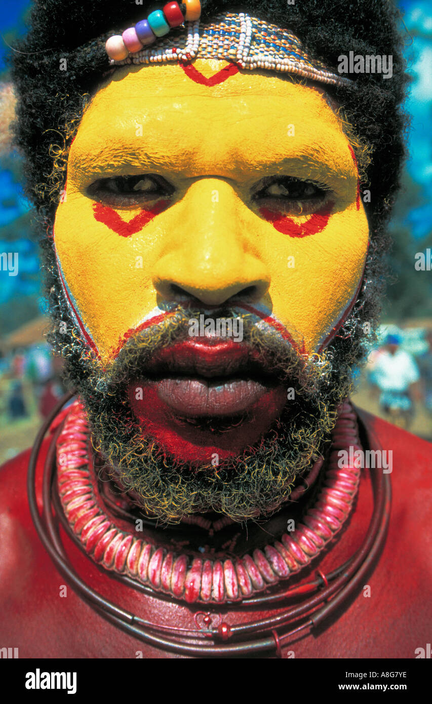 decorated aboriginal with yellow painted face, Mt. Hagen, Papua New ...