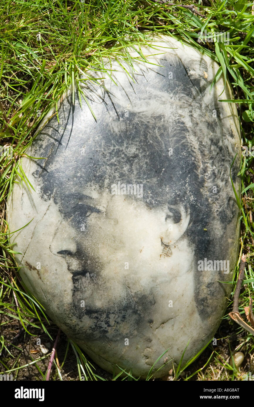 Printed stone face Stock Photo - Alamy