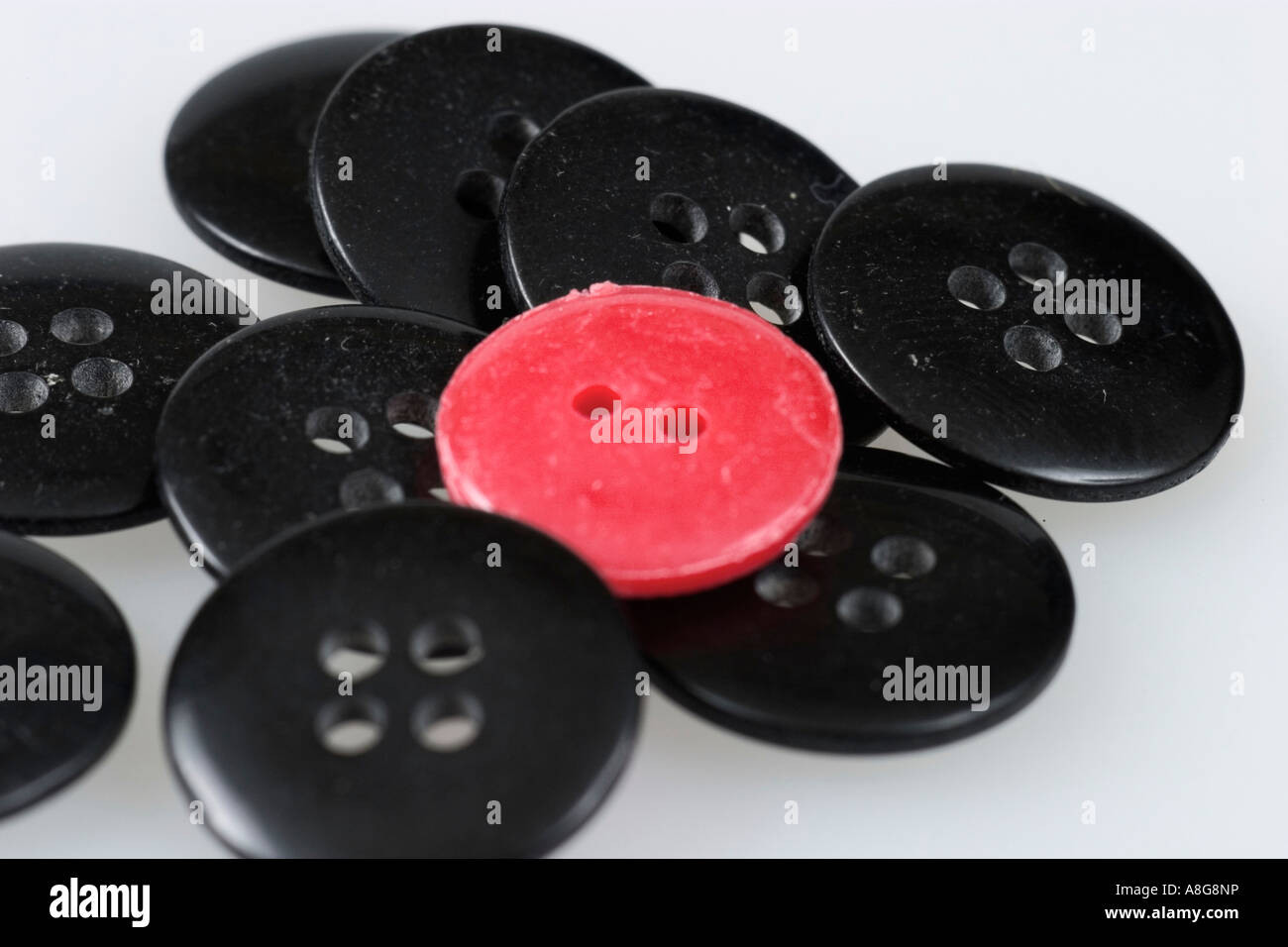Pile of red and black bottons Stock Photo - Alamy