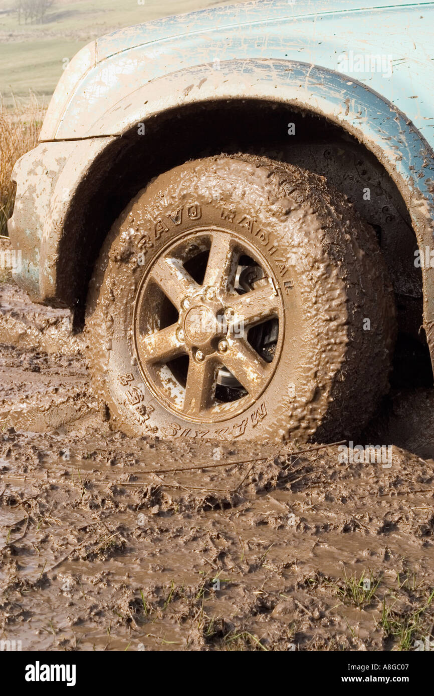 Close up of 4x4 wheel in mud Stock Photo - Alamy