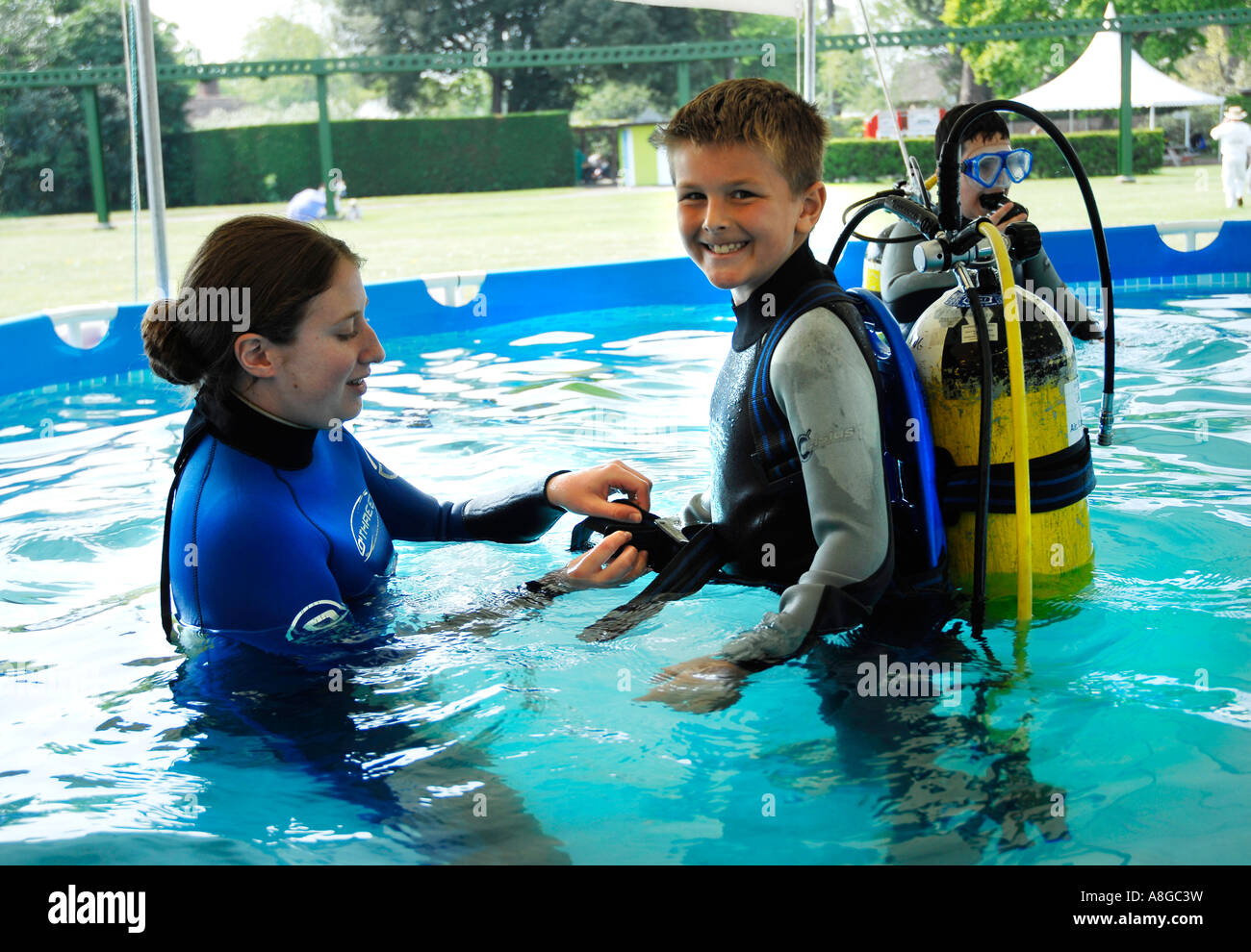Boy taking scuba diving lessons Stock Photo - Alamy
