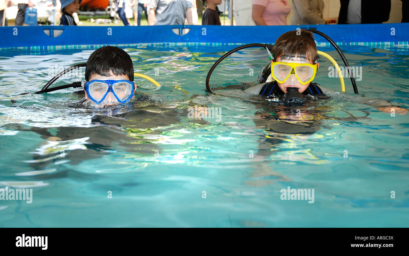 Boy taking scuba diving lessons Stock Photo - Alamy
