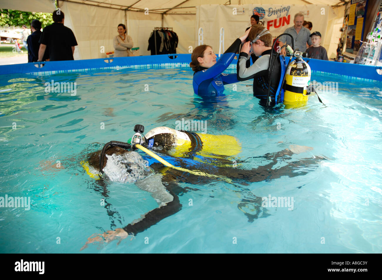 Boy taking scuba diving lessons Stock Photo - Alamy