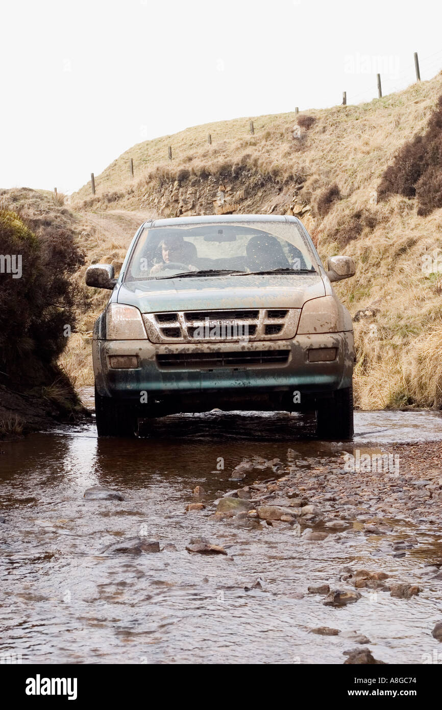 4x4 off road driving through water Stock Photo - Alamy
