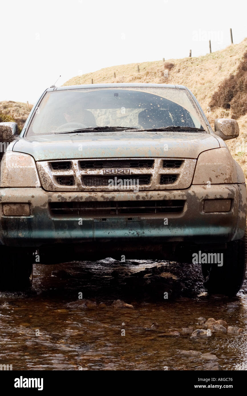 4x4 off road driving through water Stock Photo - Alamy