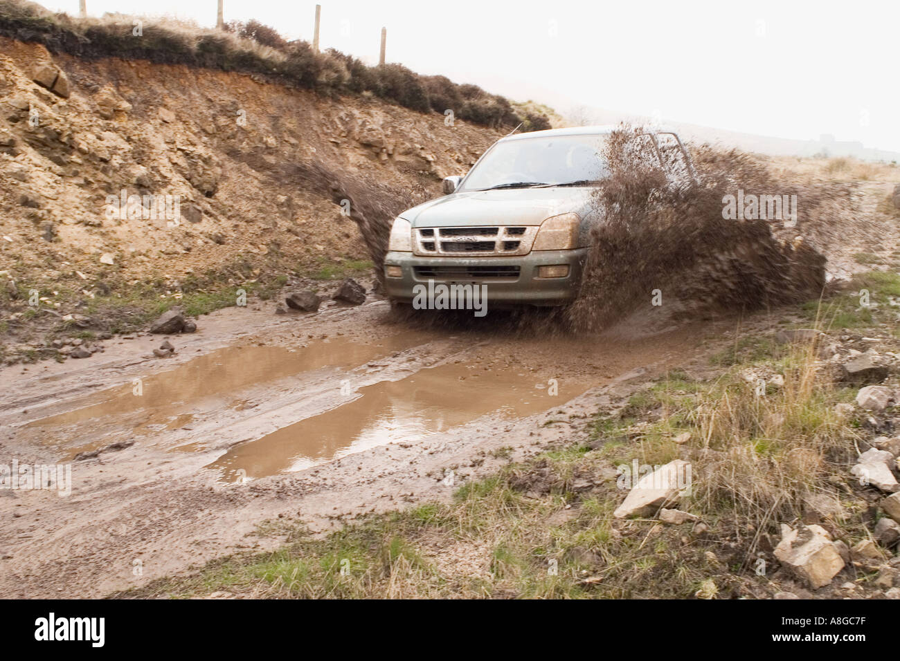 4x4 off road driving through water Stock Photo - Alamy