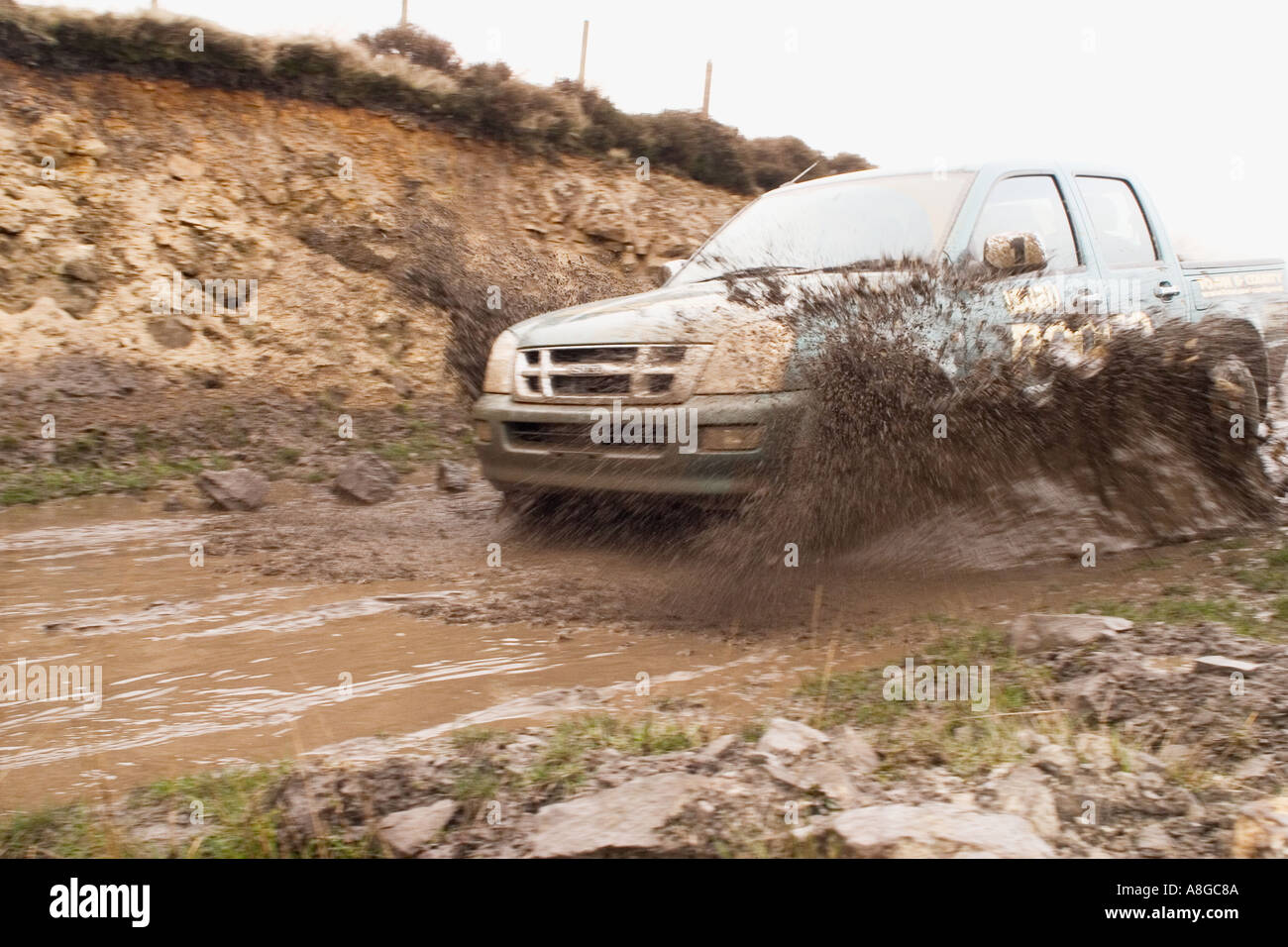 4x4 off road driving through water Stock Photo - Alamy