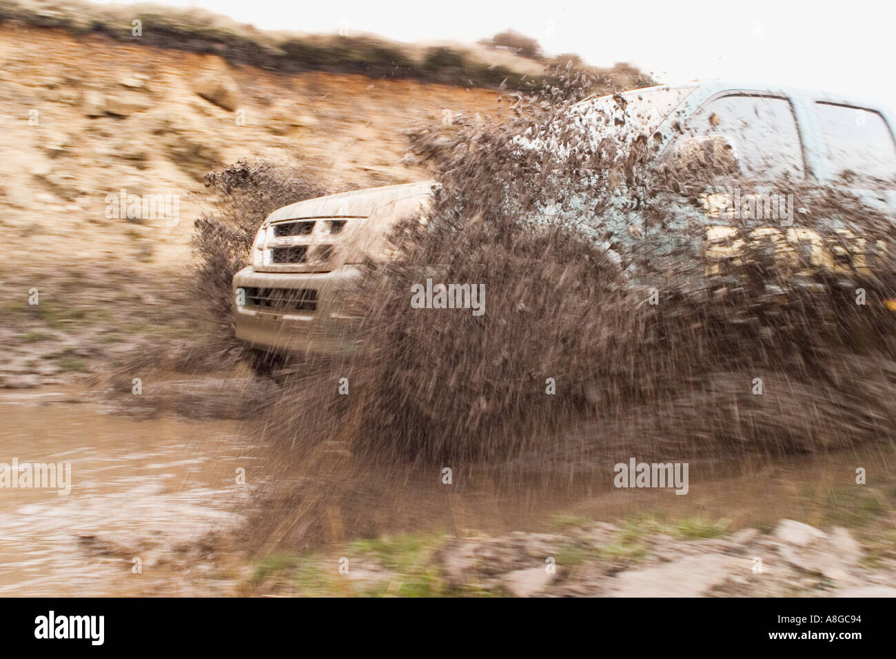 4x4 off road driving through water Stock Photo - Alamy